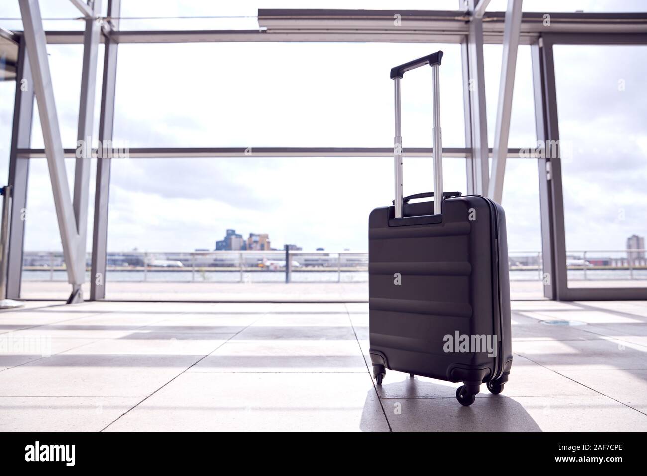 Unattended Suitcase Posing Security Threat In Airport Building Stock ...