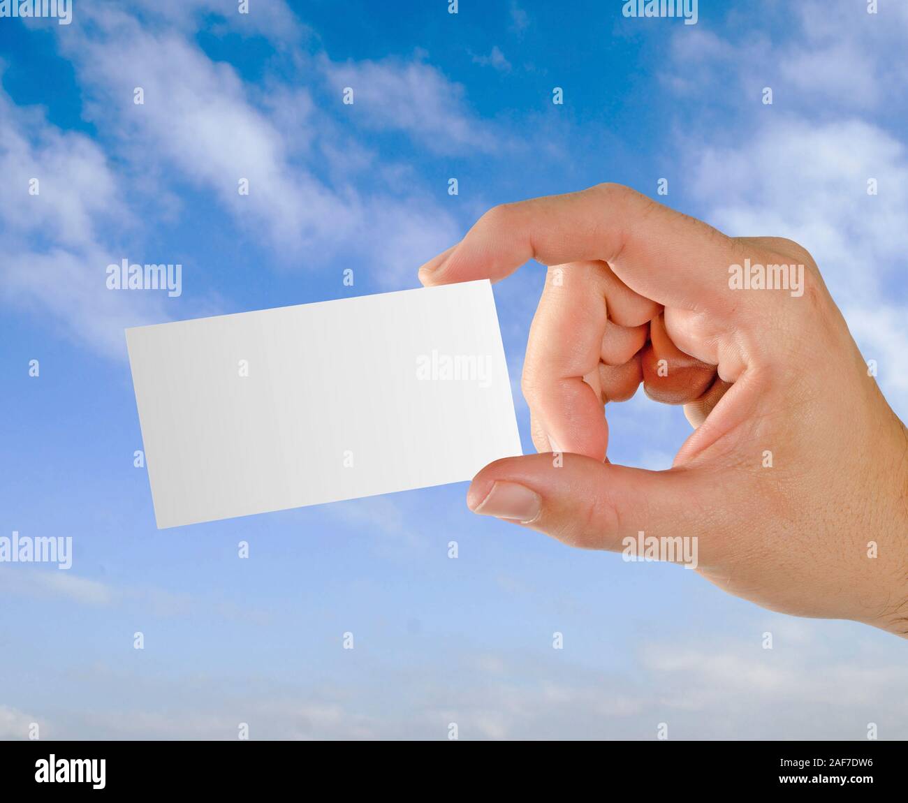 Hand with business card Stock Photo - Alamy
