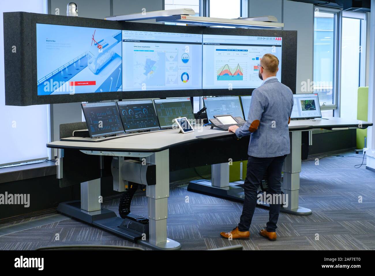 Engineering monitoring system with multiple screens Stock Photo - Alamy