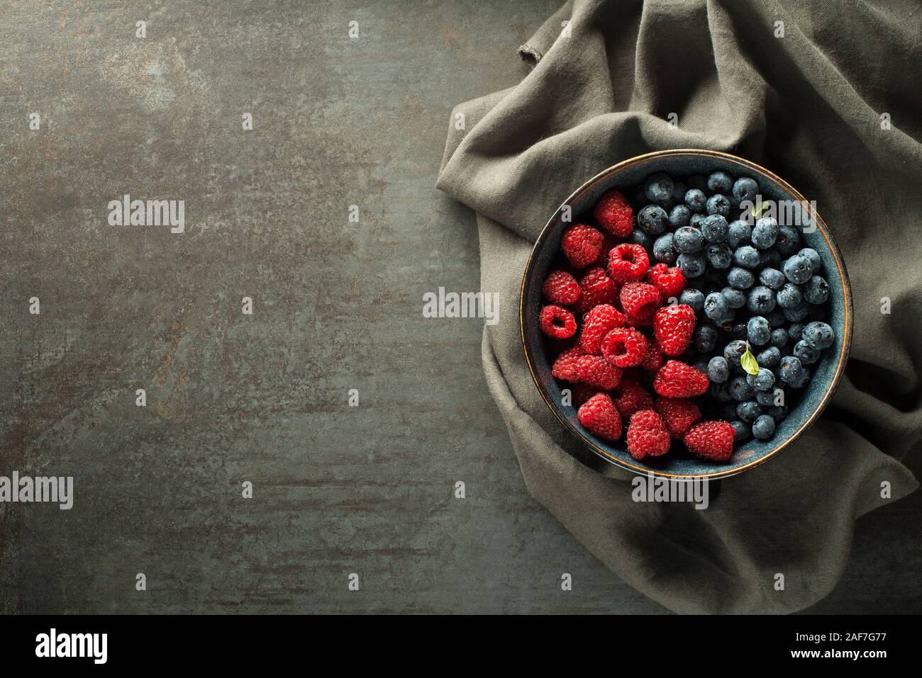 Colorful assorted mix of blueberry and raspberry. Berries overhead ...