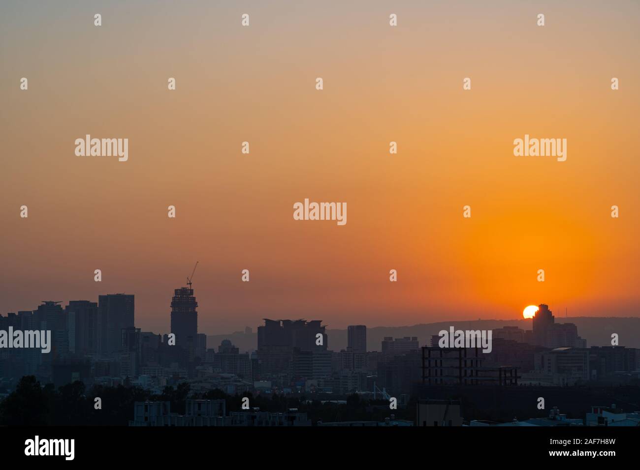 Modern city skyline in sunset time with colourful sky background Stock ...