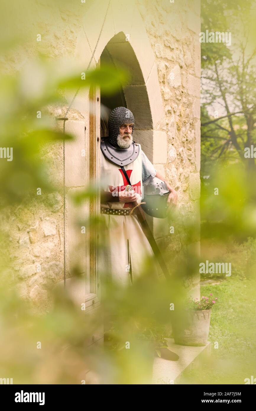 Outdoor pose of a man dressed in authentic Knight Templar outfit or ...