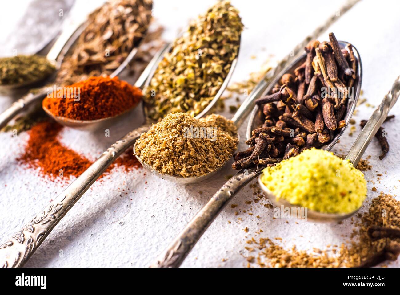 Various spices ground turmeric pepper ginger cinnamon herb seasoning ...