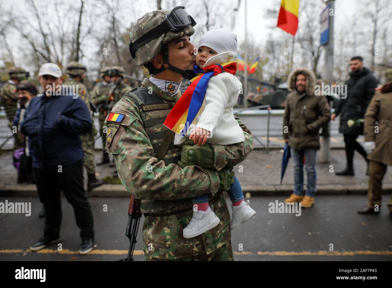Bucharest, Romania - December 01, 2019: Romanian army soldier holds his ...