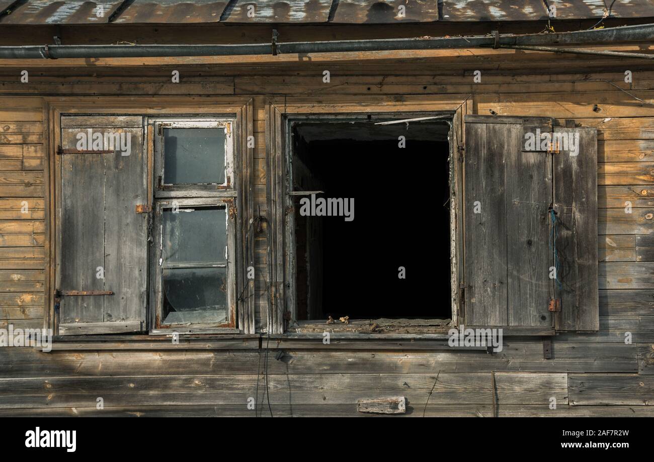 Broken window frame of old wooden house Stock Photo - Alamy