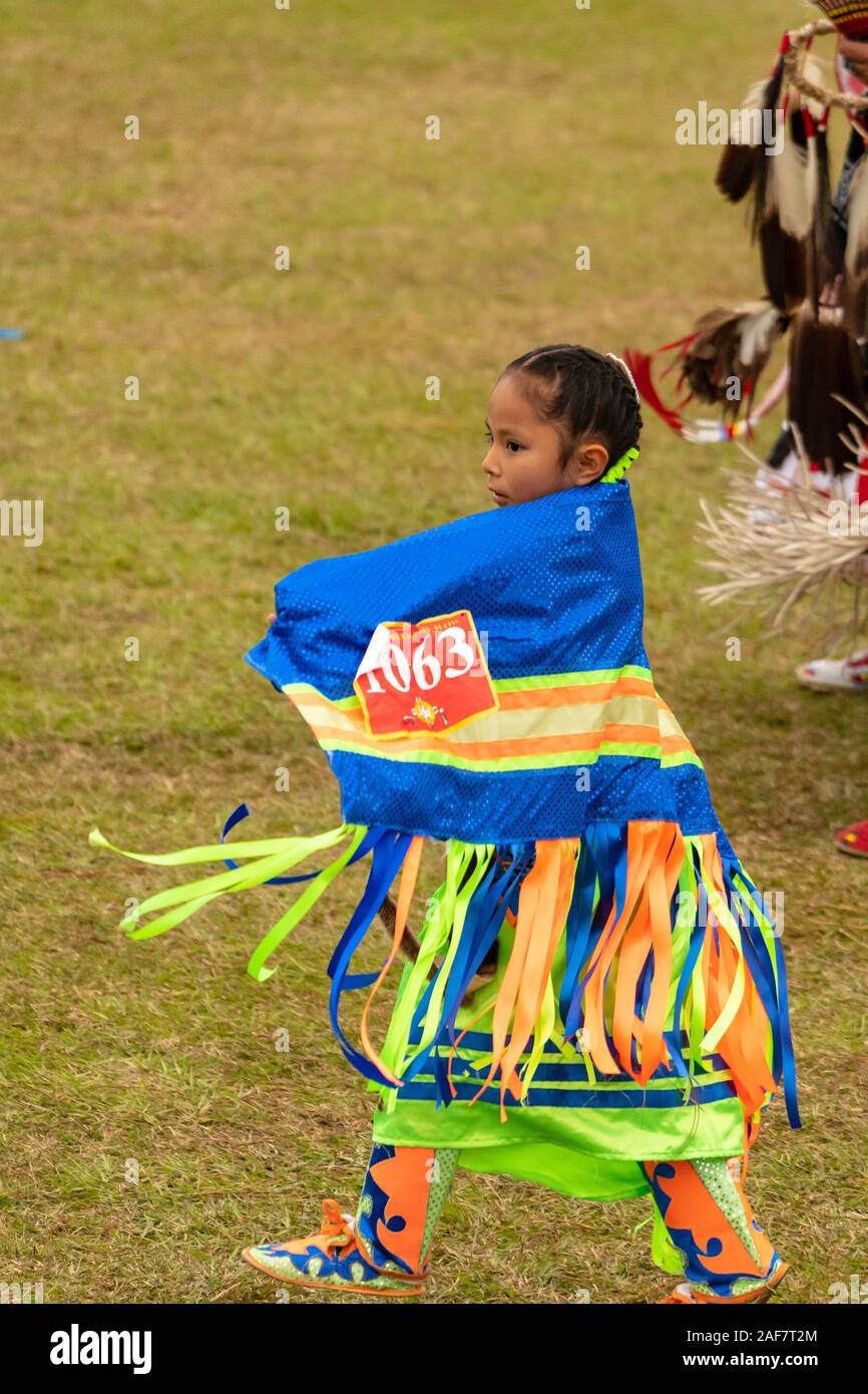 A young girl dances at the Poarch Creek Indian Thanksgiving Pow Wow ...