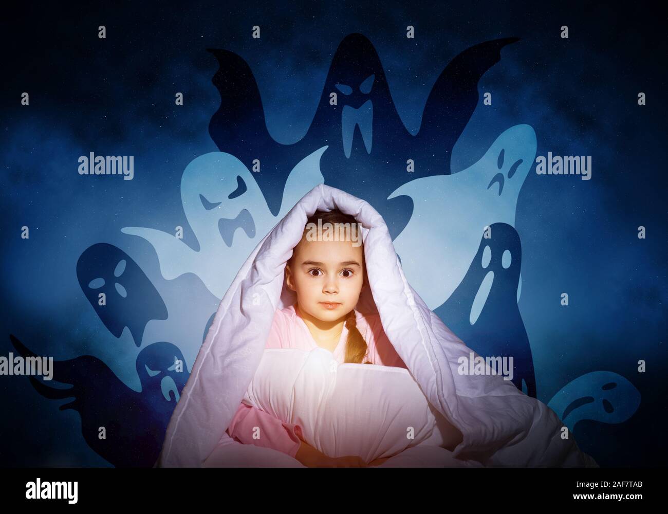 Scared girl hiding under blanket. Startled kid sitting in bed on night ...