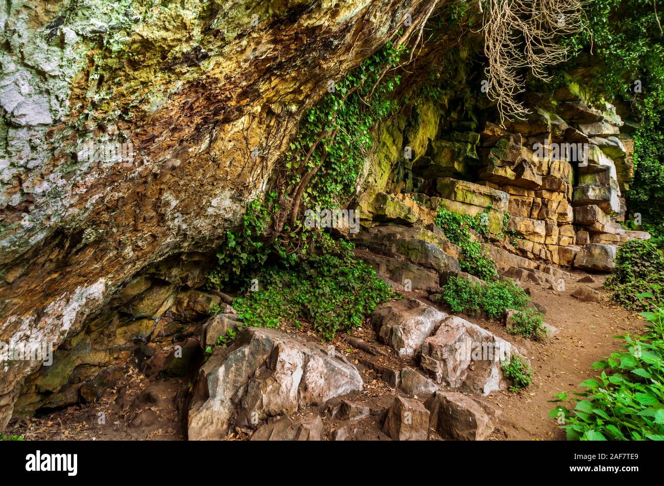 Rock arch near Pin Hole cave at Creswell Crags, a Magnesian limestone ...