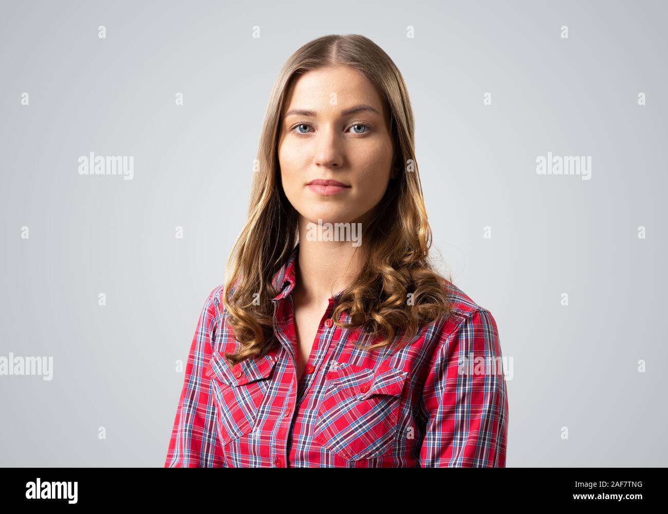 Young woman having serious and calm face. Caucasian female student has ...