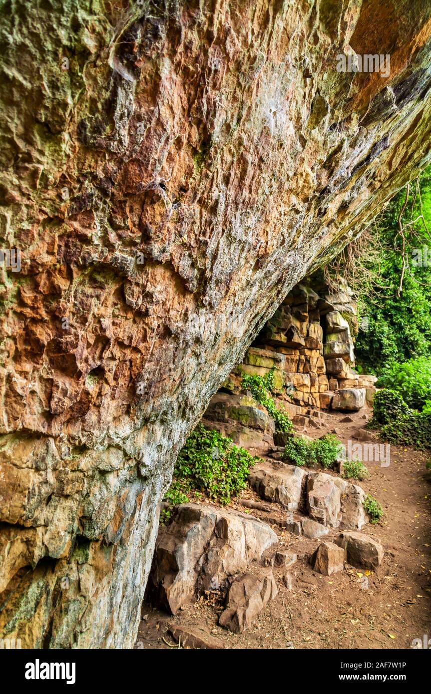 Rock arch near Pin Hole cave at Creswell Crags, a Magnesian limestone ...