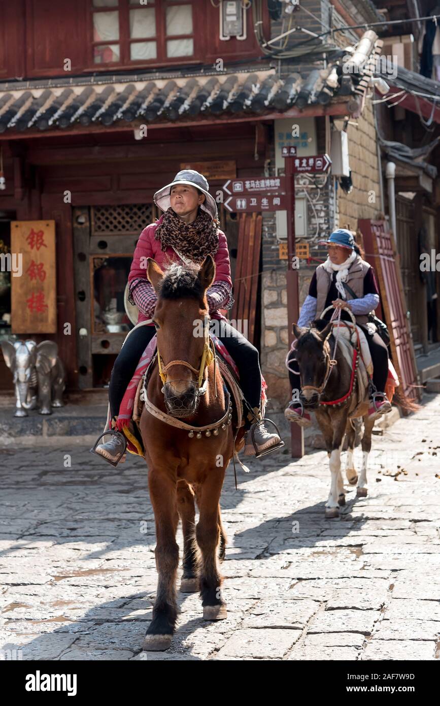 Asian women riding horse hi-res stock photography and images - Alamy