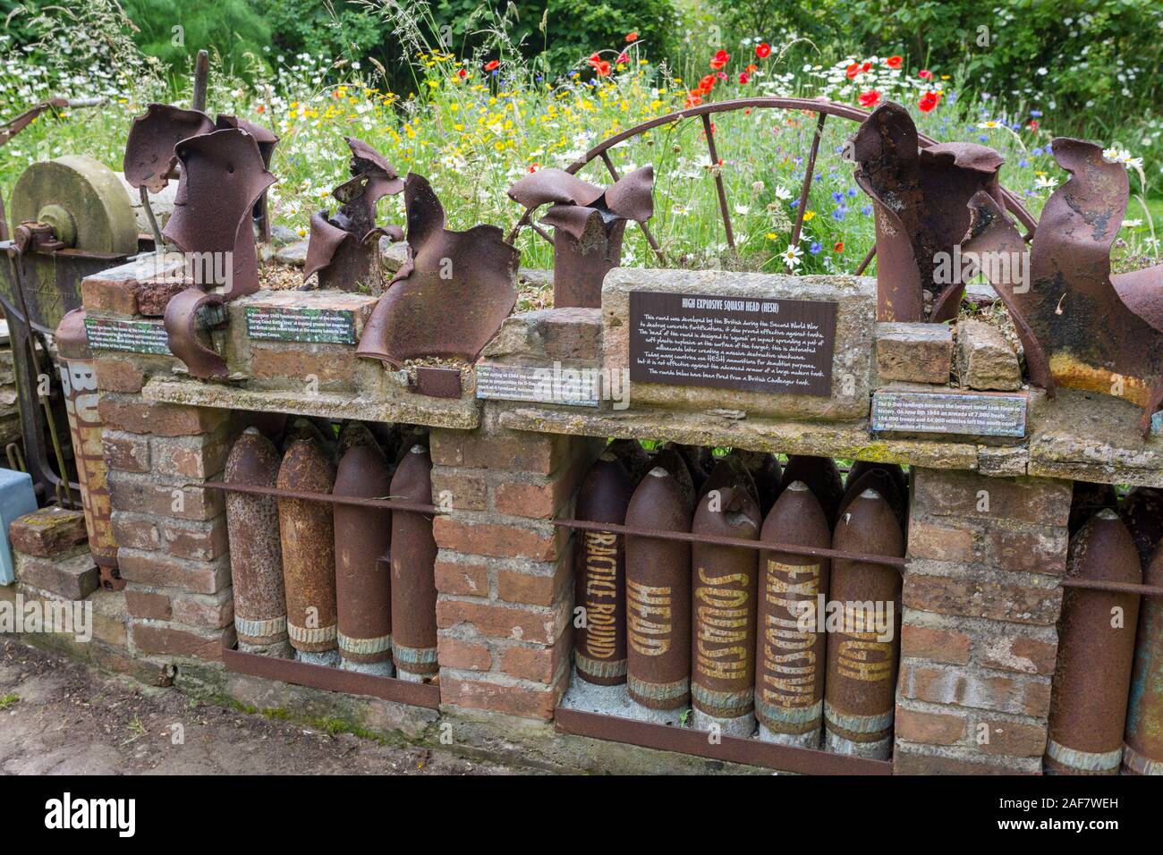 Assorted rusty shell cases and shrapnel used to build a wall in the ...