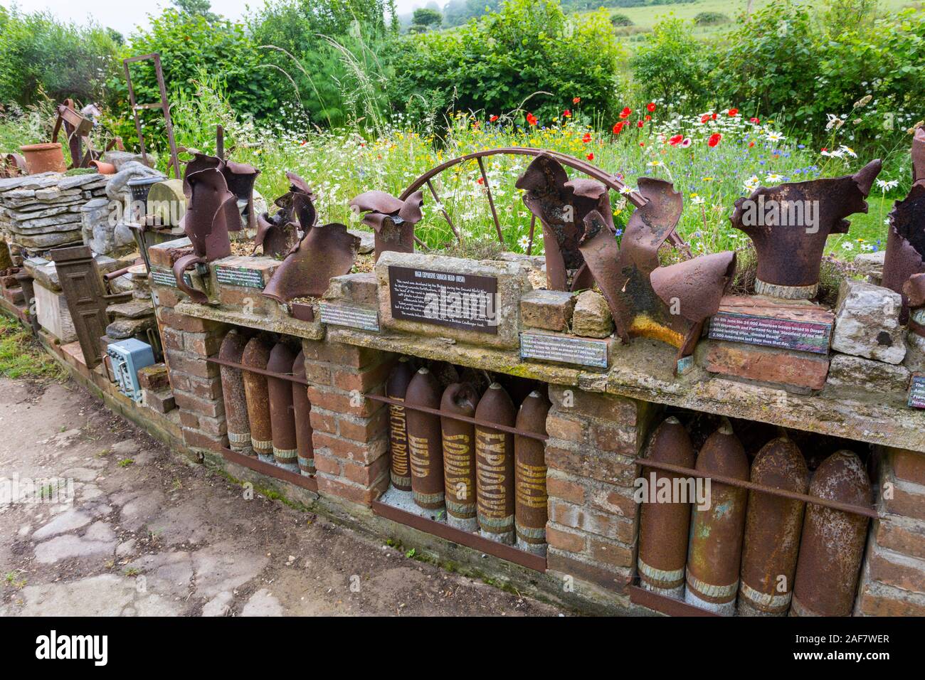 Assorted rusty shell cases and shrapnel used to build a wall in the ...
