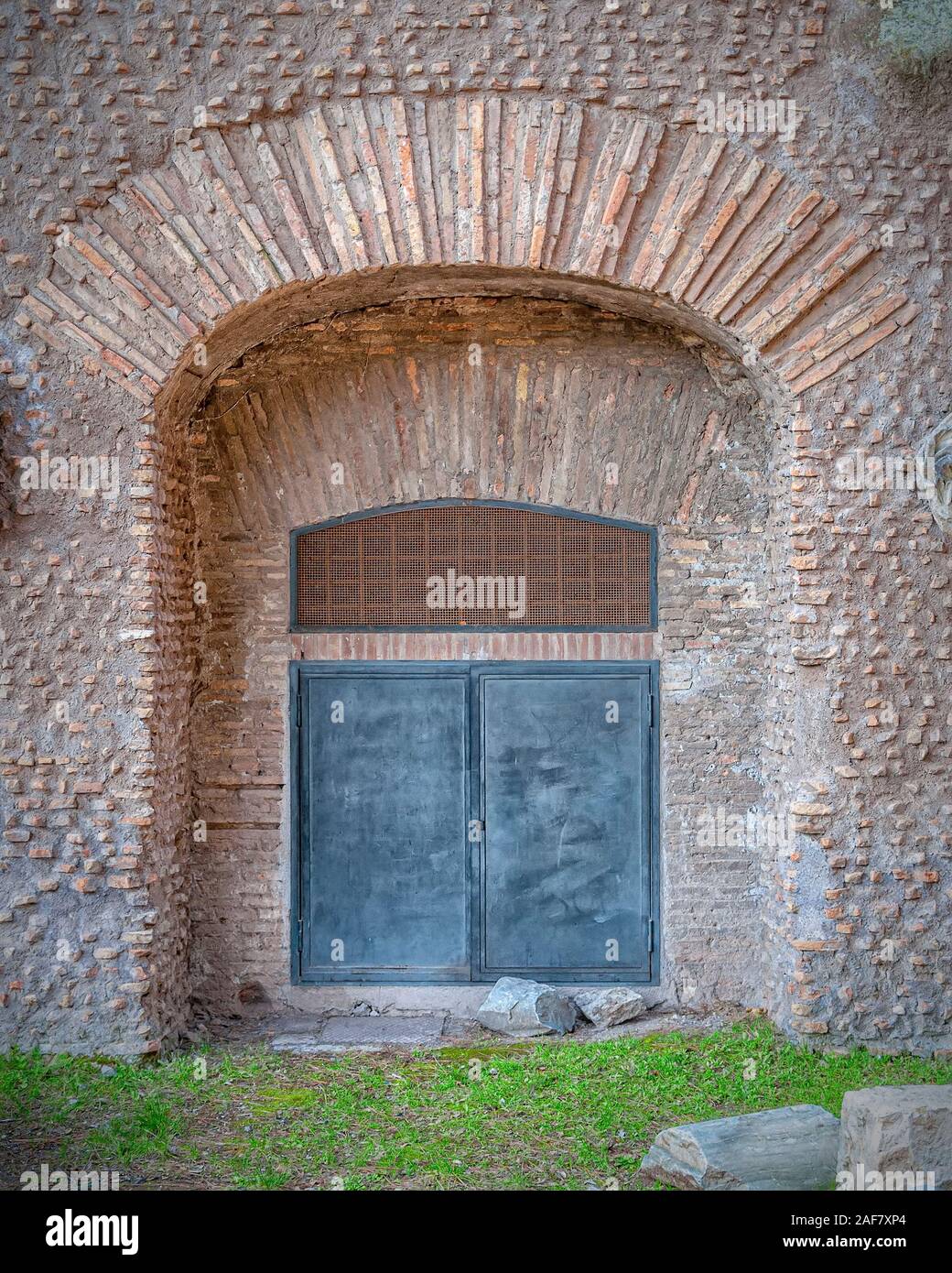 An ancient doorway situated in the roman forum UNESCO site in Rome ...
