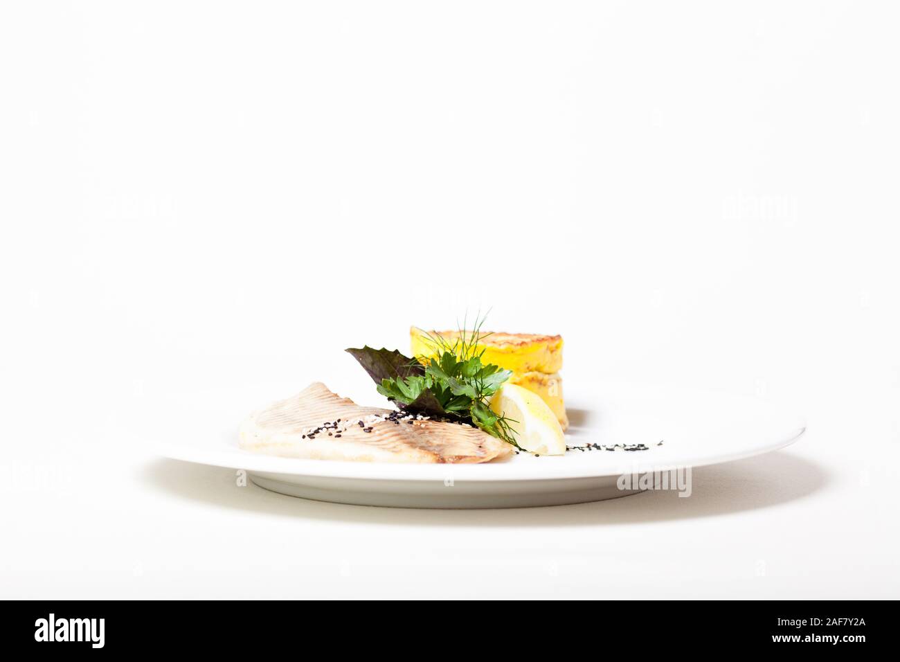 Steamed white fish with baked pudding Stock Photo - Alamy