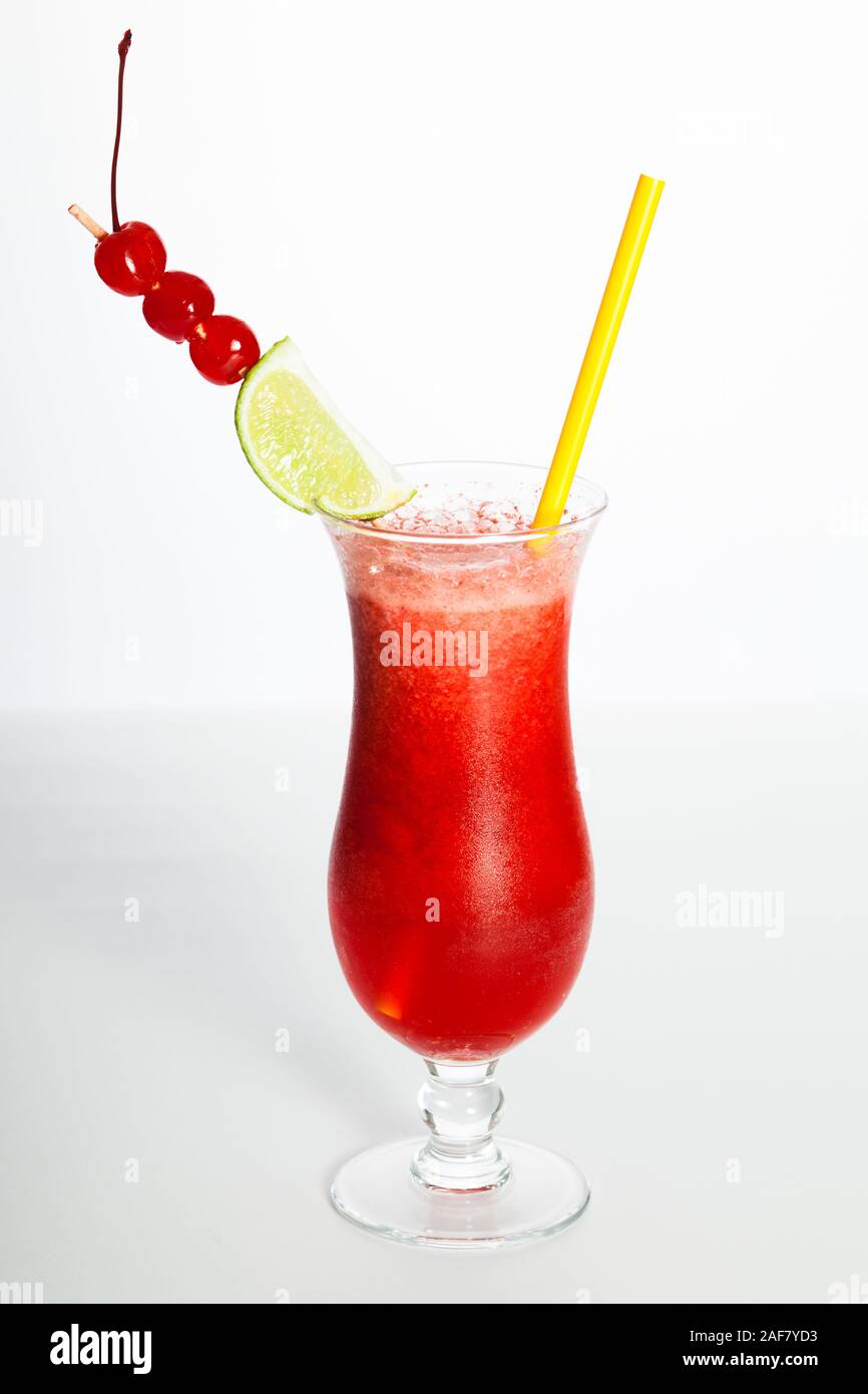 Colorful cocktail decorated with fruits in a tall glass Stock Photo - Alamy