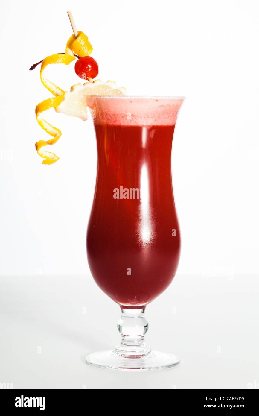 Colorful cocktail decorated with fruits in a tall glass Stock Photo - Alamy
