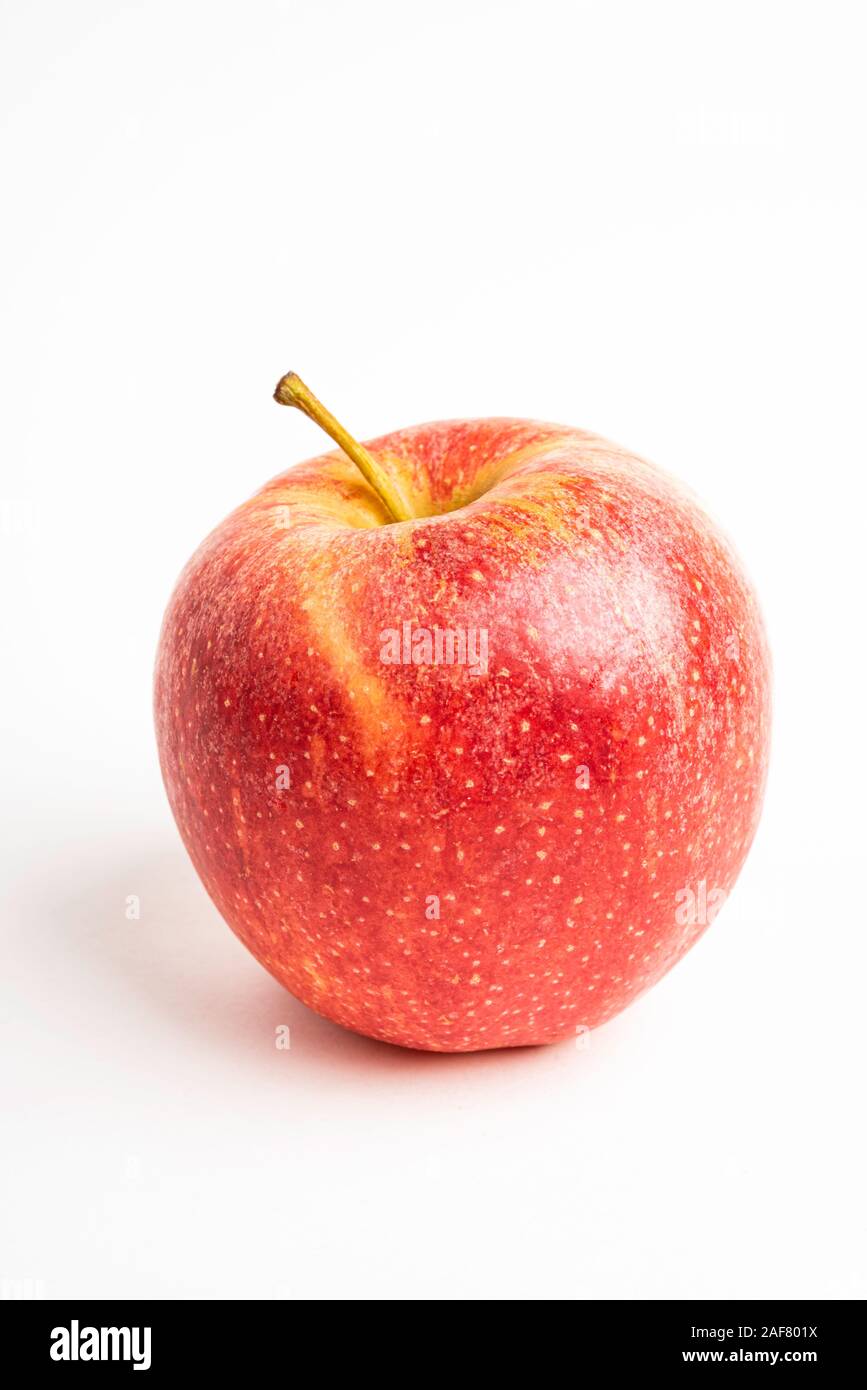 One fresh red apple isolated on a plain white background Stock Photo ...