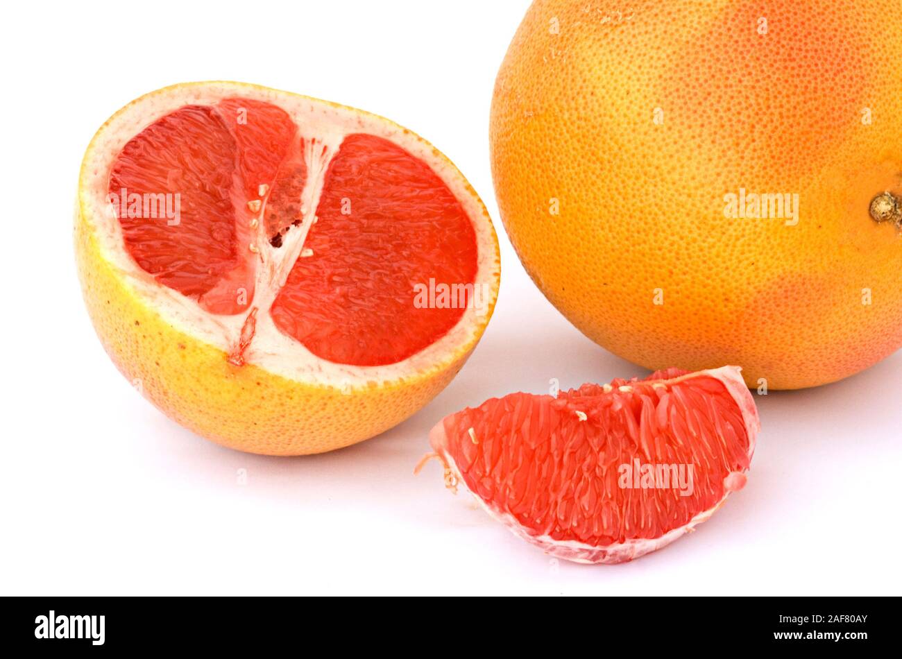Close up of sections of grapefruit isolated on white background Stock ...