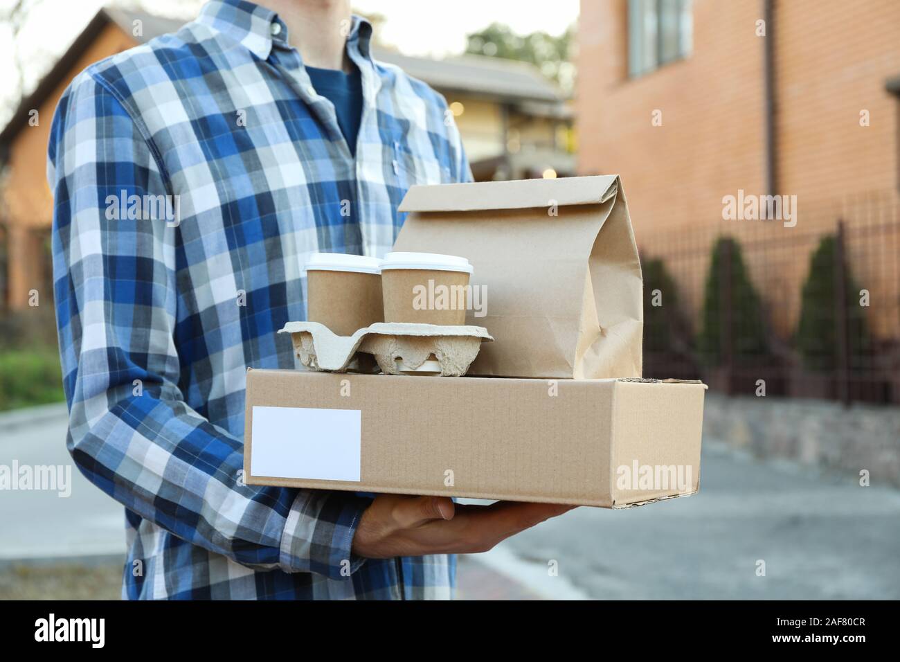 Bring delivery man hi-res stock photography and images - Alamy