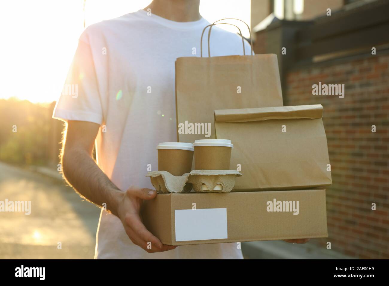 Bring delivery man hi-res stock photography and images - Alamy