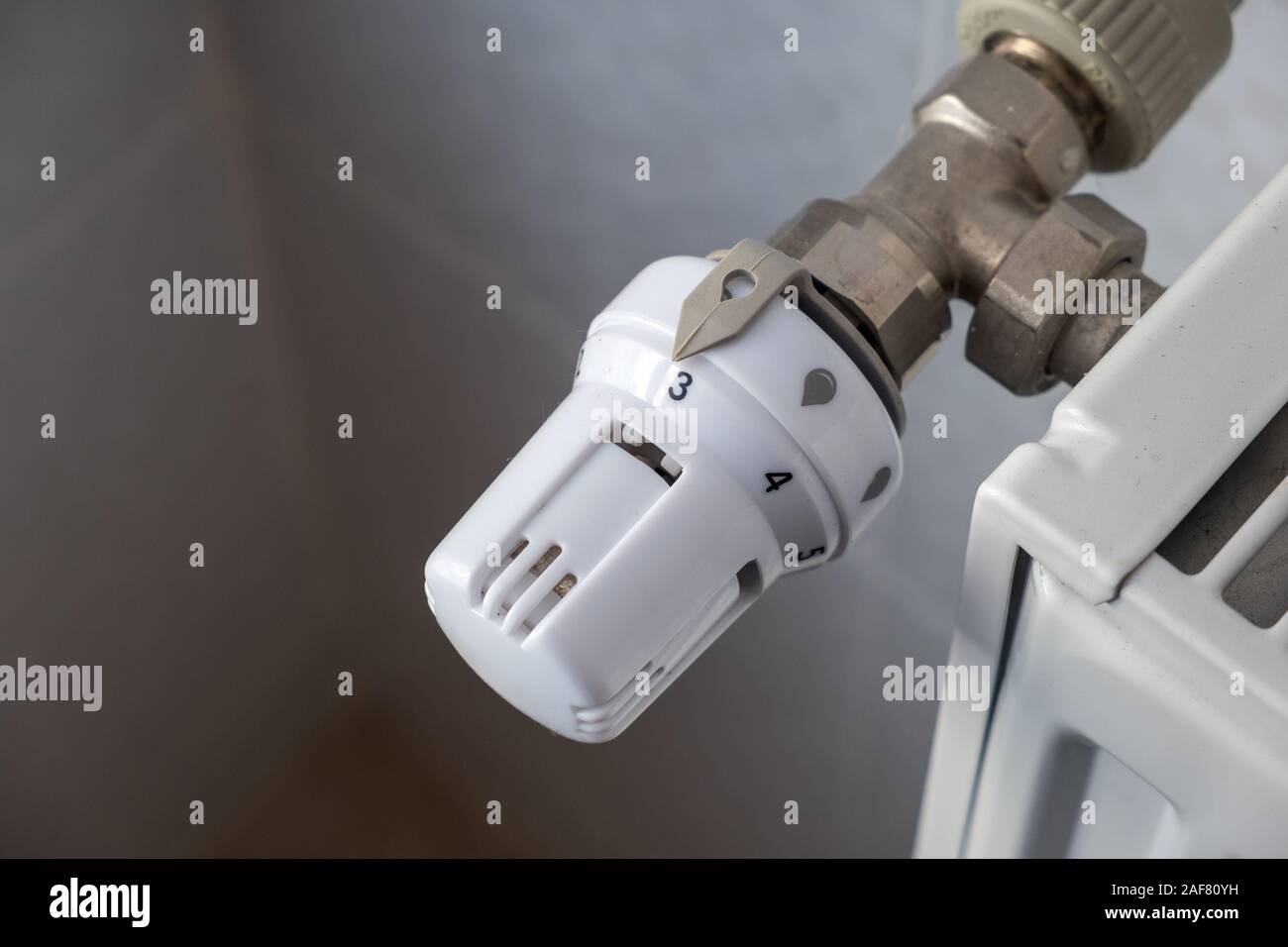 Closeup of heating radiator valve for comfortable temperature ...