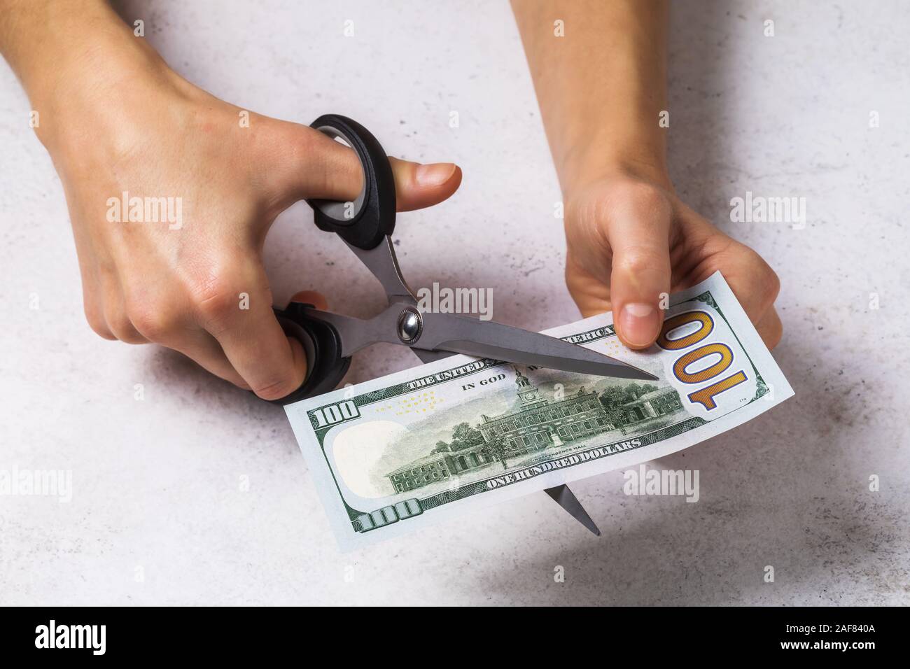 Cutting Dollar Sign High Resolution Stock Photography and Images - Alamy
