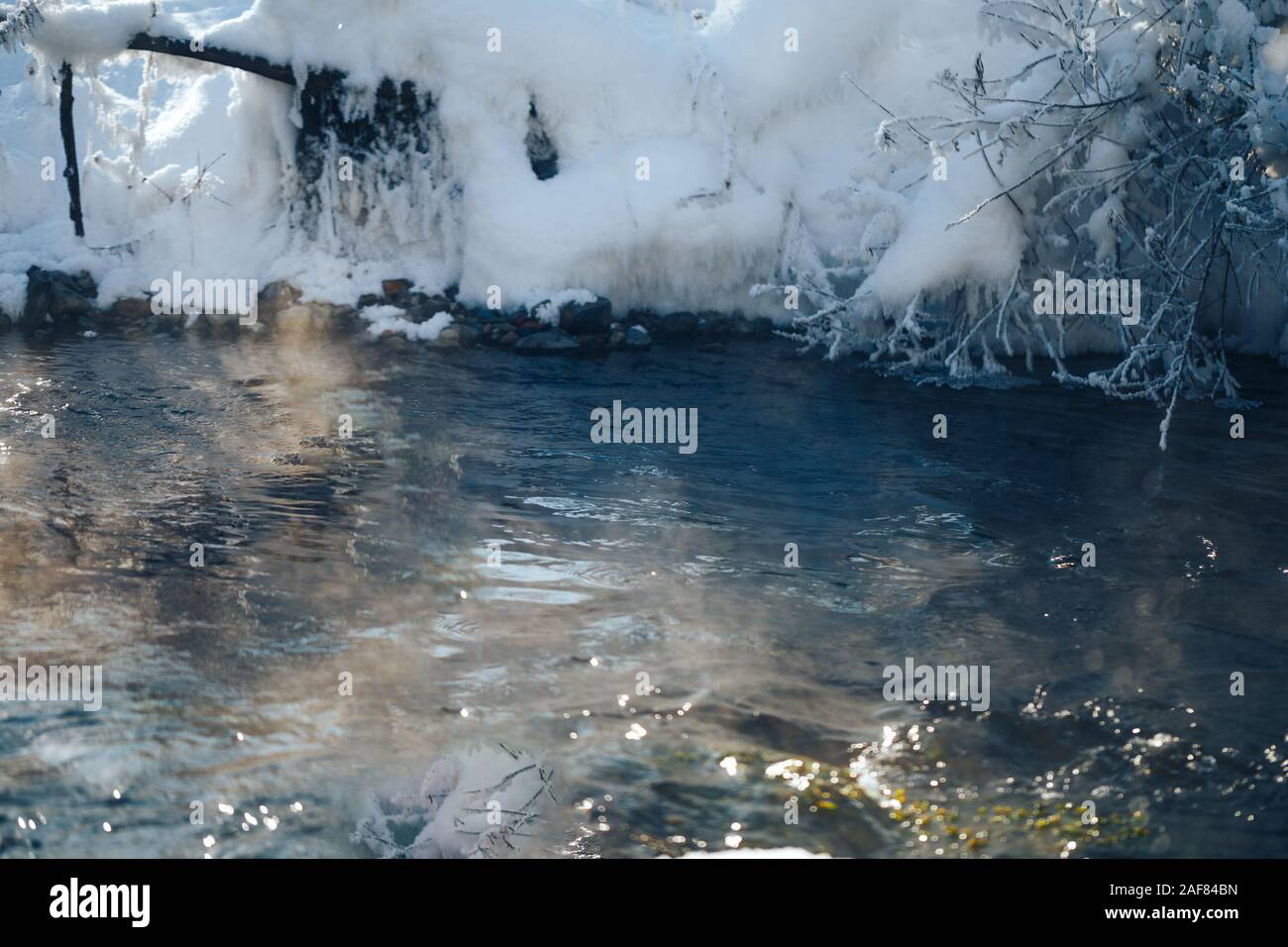 winter stream with snow Stock Photo - Alamy