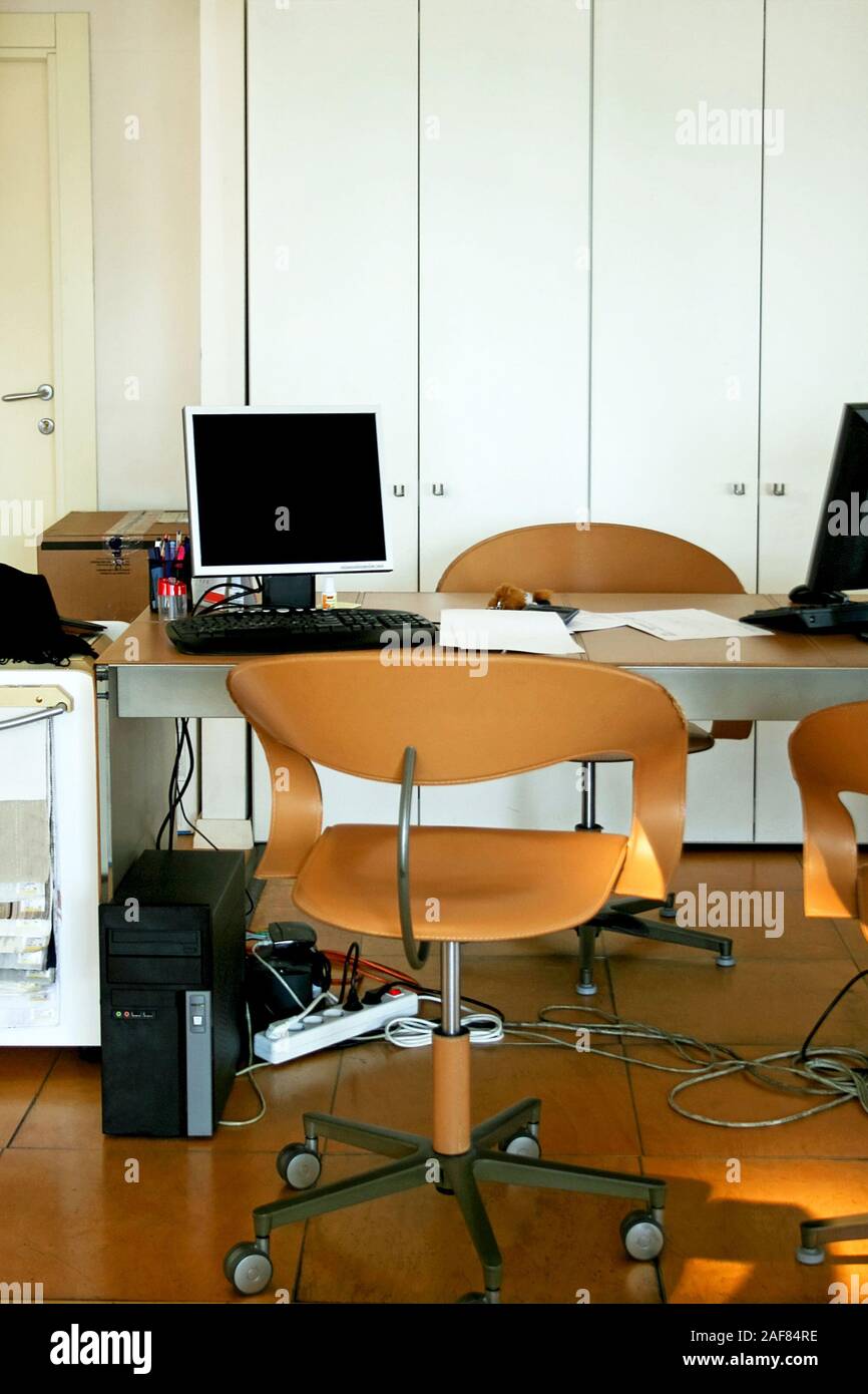 Interior view of office with brown desk Stock Photo - Alamy