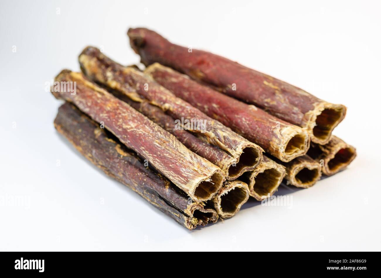 Dried beef esophagus. Standard size treats for dogs. Pile of natural ...