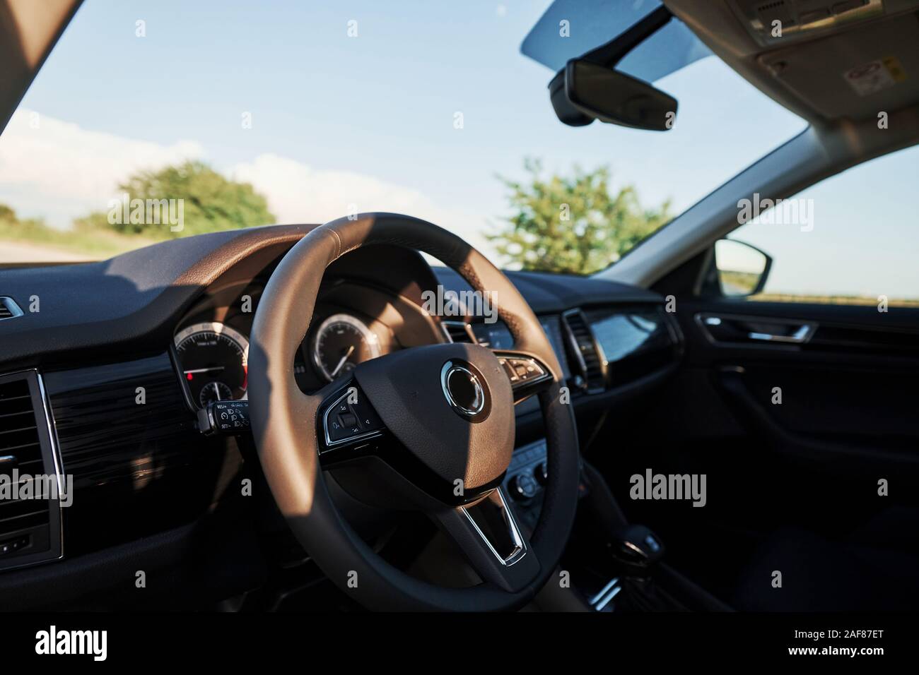 Inside modern car. Front panel, steering wheel, quality material Stock ...