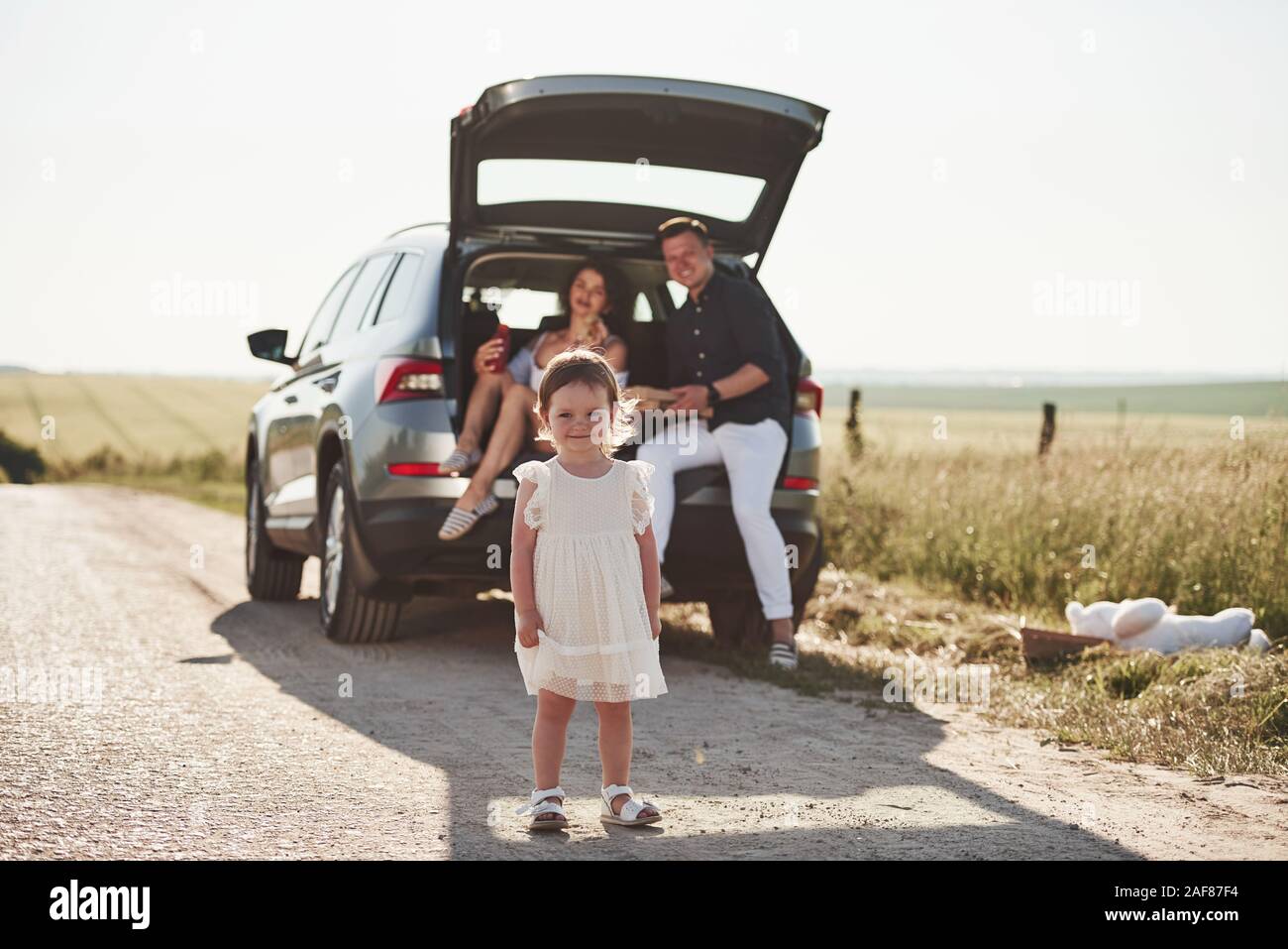 Shy kid. Beautiful people is in the modern car at their weekends Stock ...