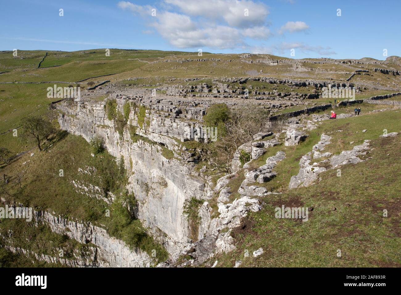 Malham Cove in Yorkshire Dales National Park is a dried up waterfall ...