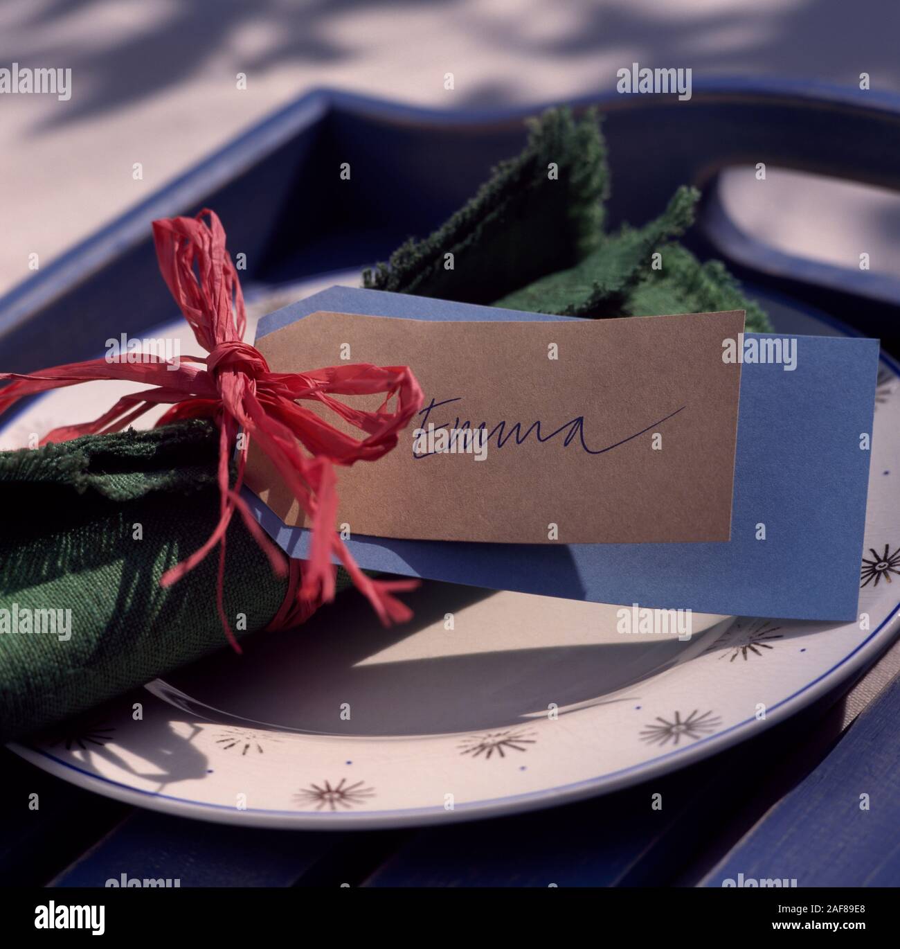 Handmade label with raffia tie Stock Photo - Alamy