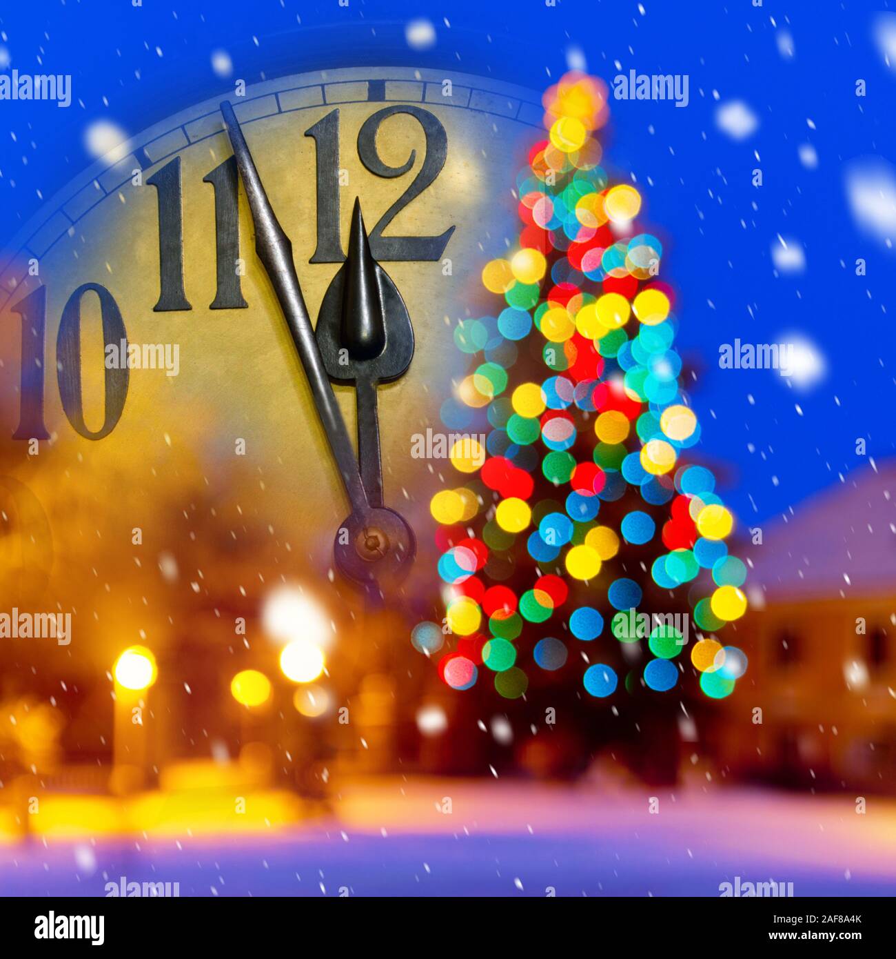 New year clock with decoration Stock Photo - Alamy