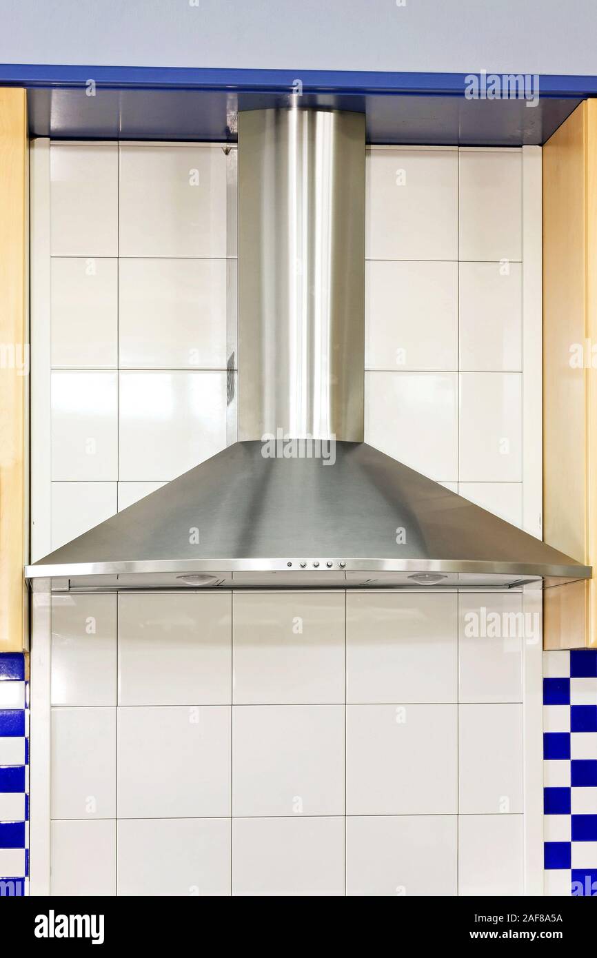 Stainless steel air ventilation in blue kitchen Stock Photo - Alamy