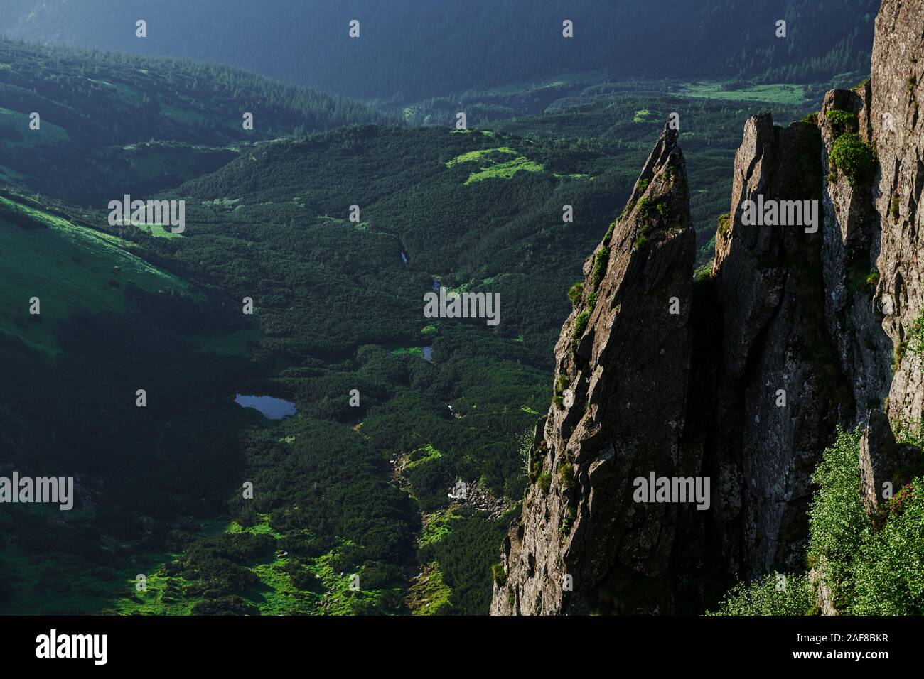 On the edge on the hill. Sharp rocks. Majestic Carpathian mountains ...