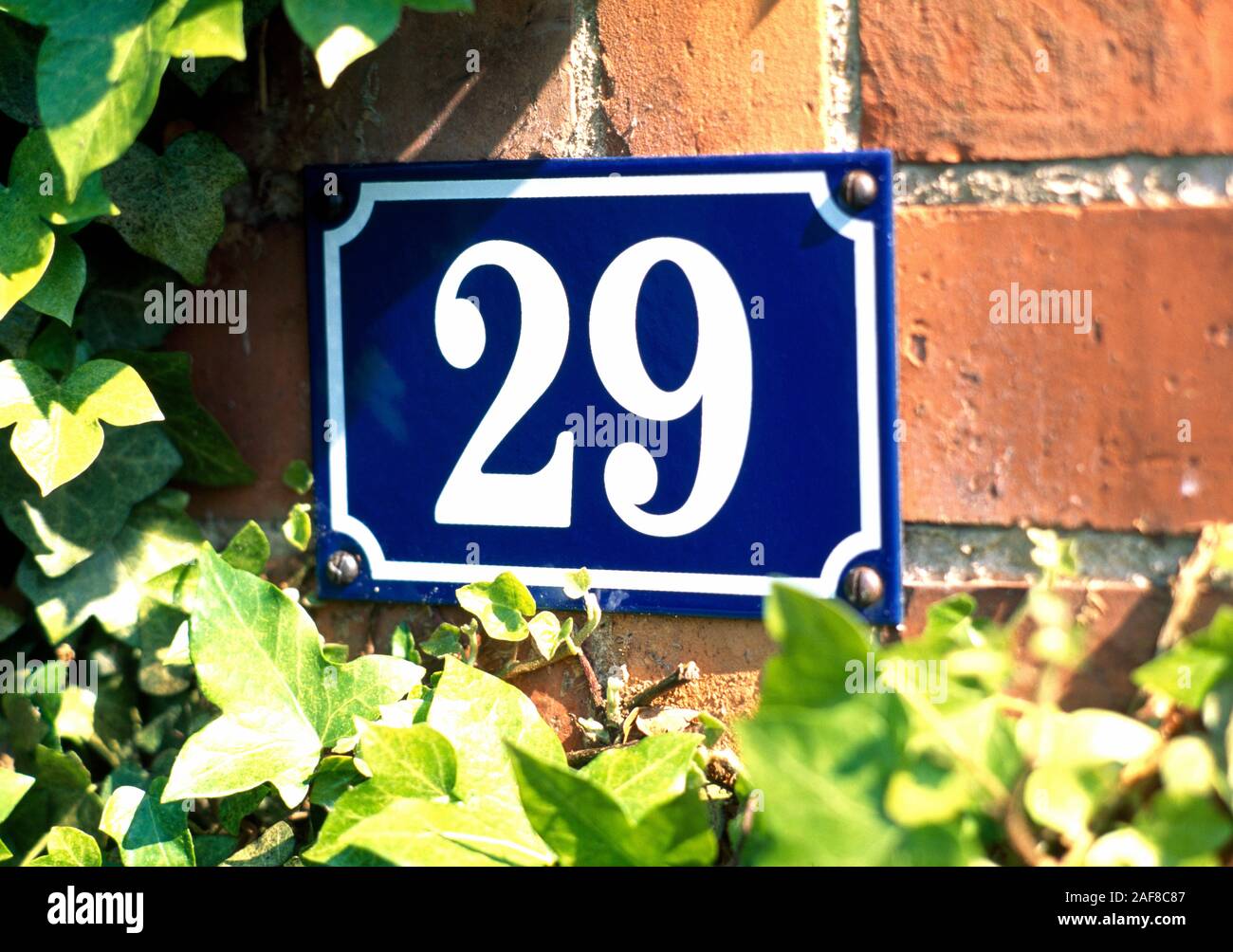 house number 29 on brick wall Stock Photo - Alamy
