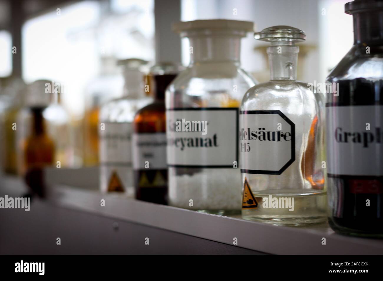 Chemical bottles at an old factory, Germany Stock Photo - Alamy