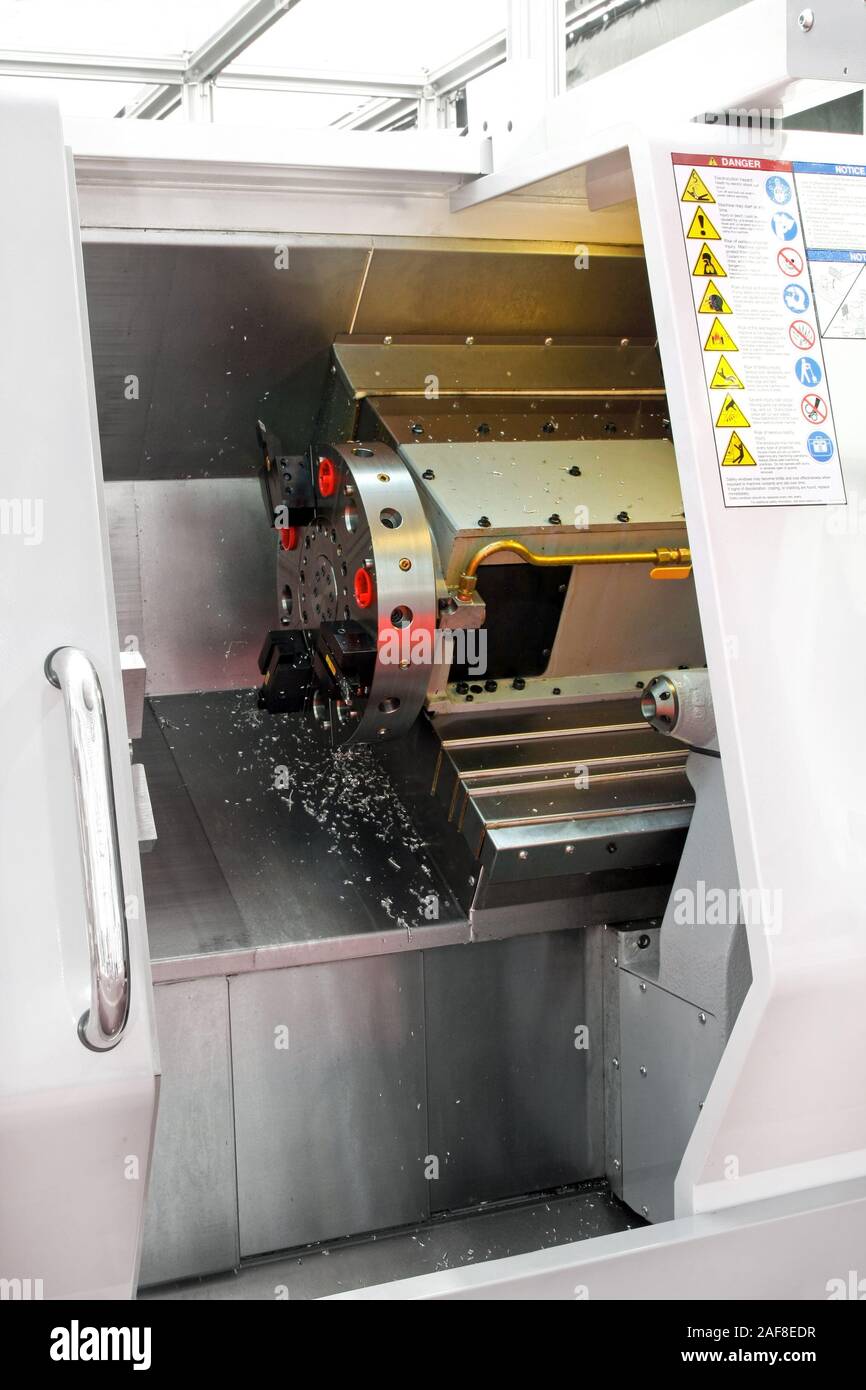 Close up shot of lathe machine interior Stock Photo - Alamy