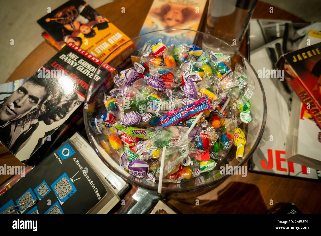 Candy bowl in a pop-up featuring merchandise with the logos of the now ...