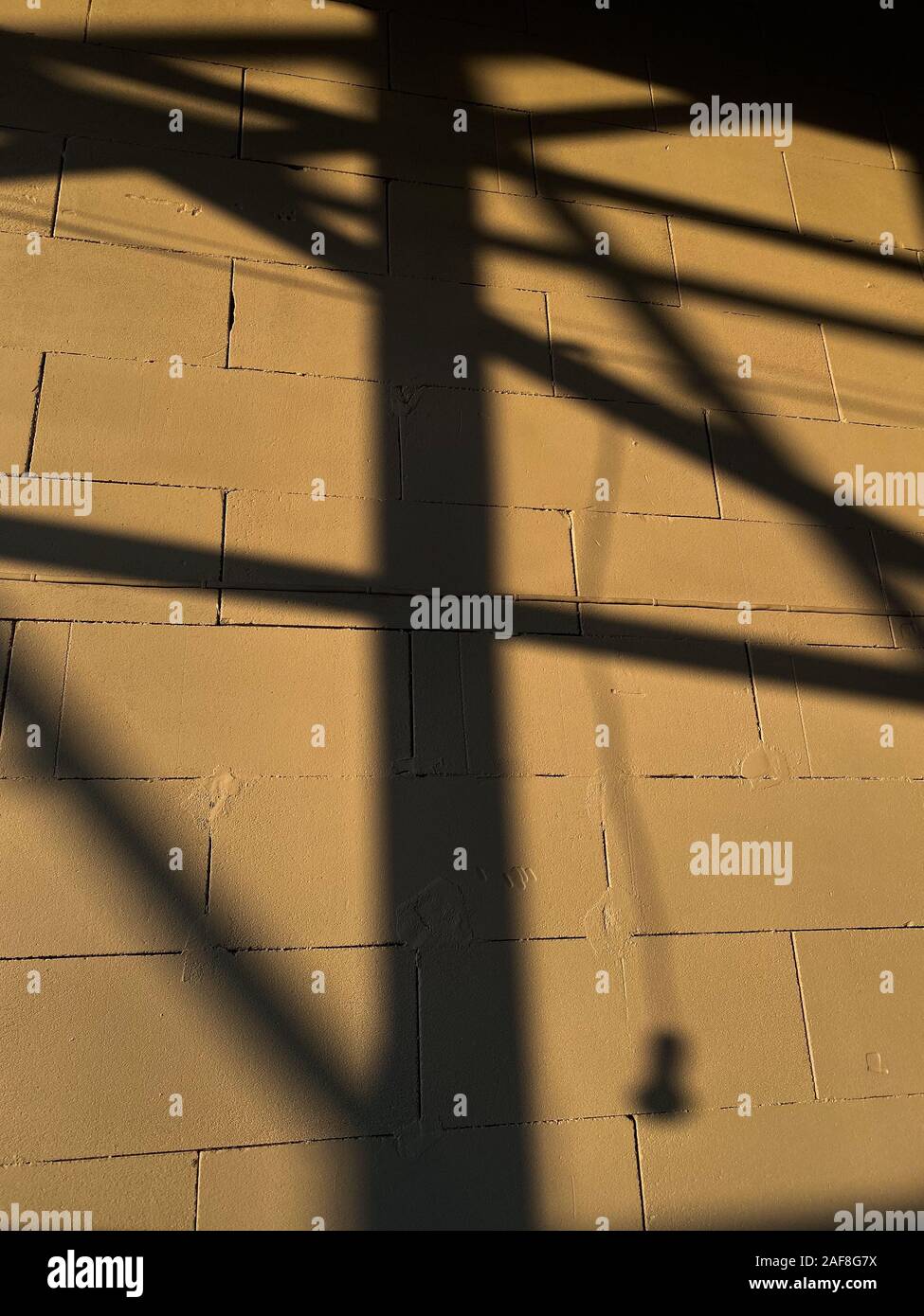 Shadow on white wall during sunset Stock Photo - Alamy