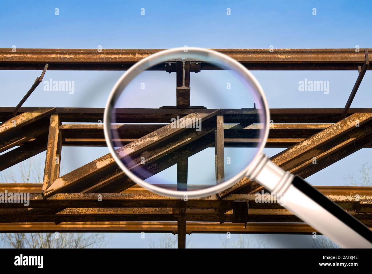 Old metal structure of an abandoned factory built with beams and metal ...