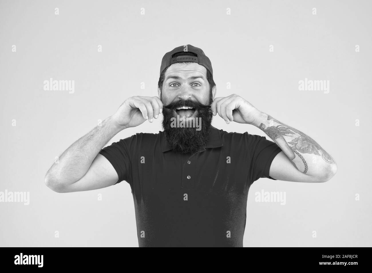 Moustache grooming guide. Hipster handsome guy touching moustache. Tips ...