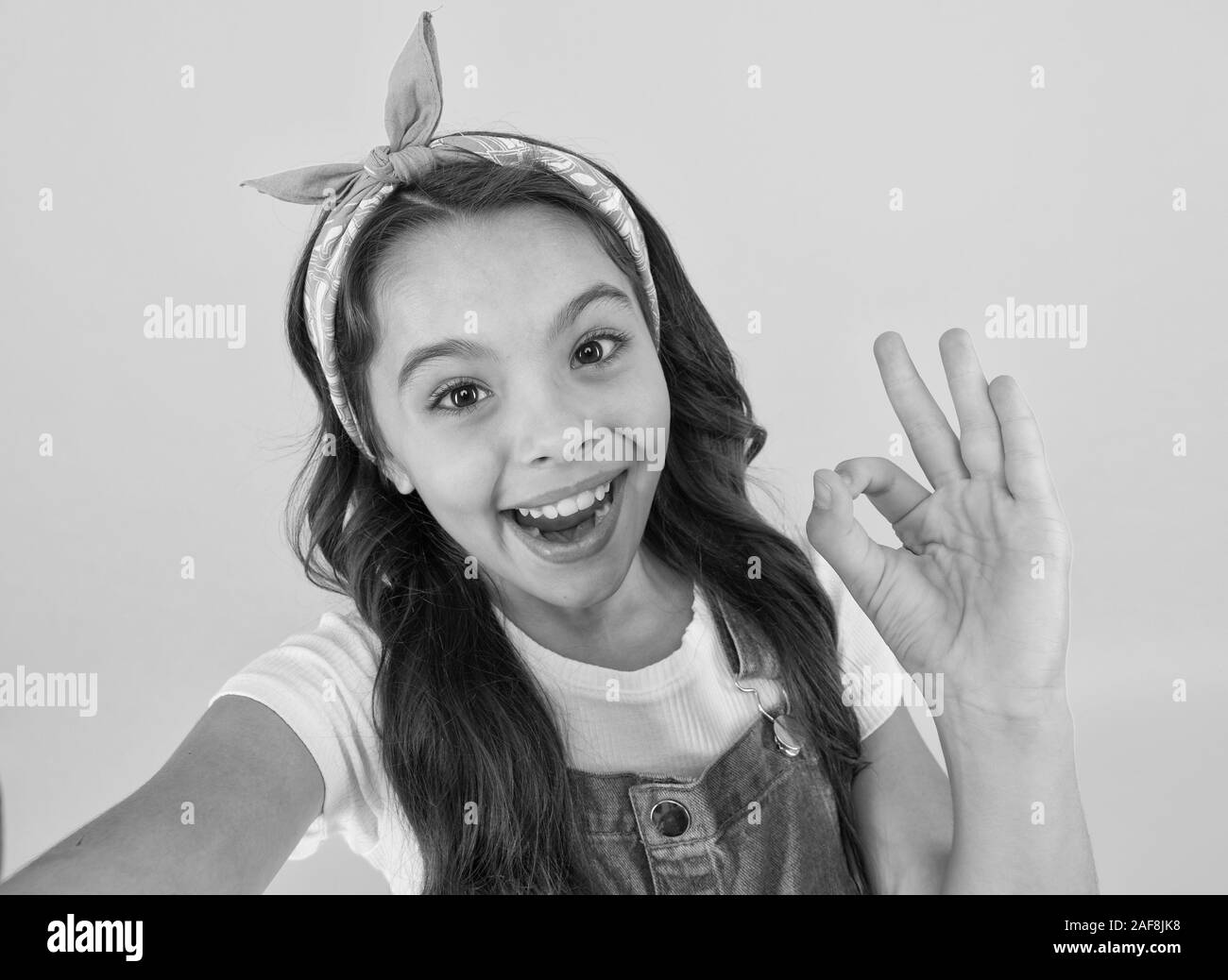 Its ok. Happy little child with ok hand on yellow background. Small ...