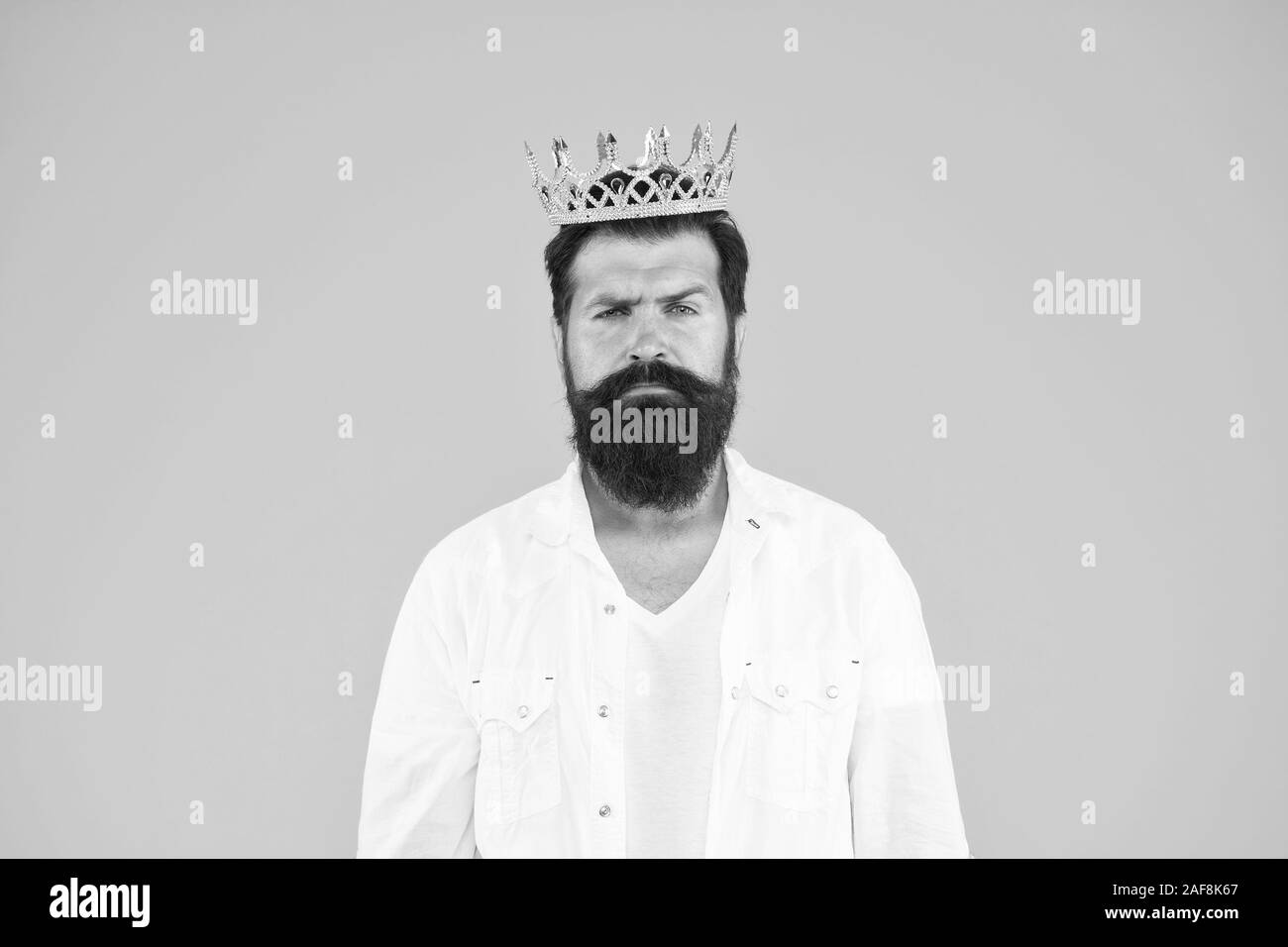 King crown. Egoist selfish man. Bearded man in white clothes ...