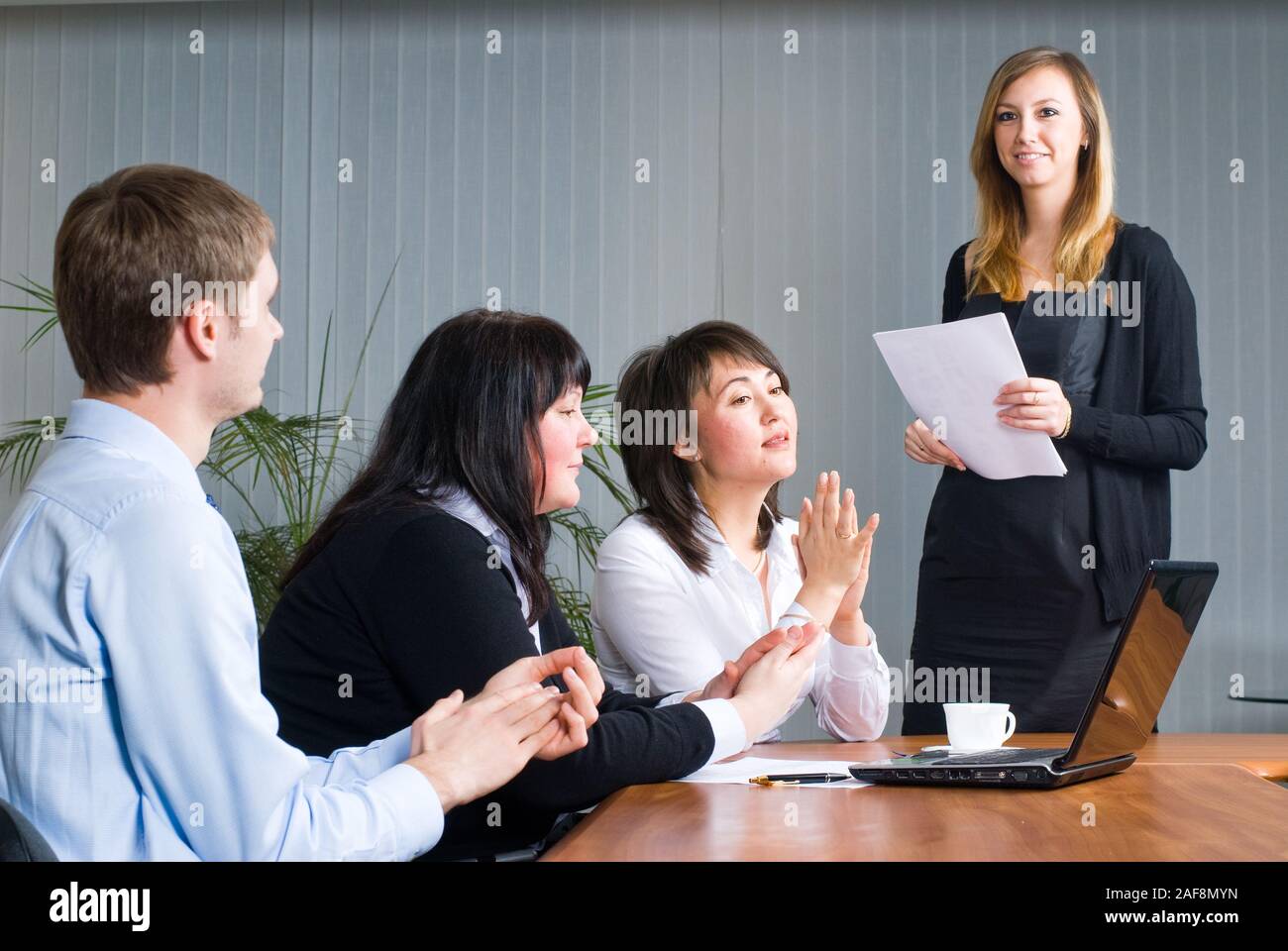 Woman making a business presentation Stock Photo - Alamy