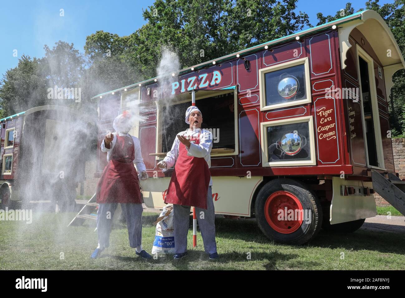 Artists Tweedy the Clown and Jan Erik Brenner joke around with flour ...