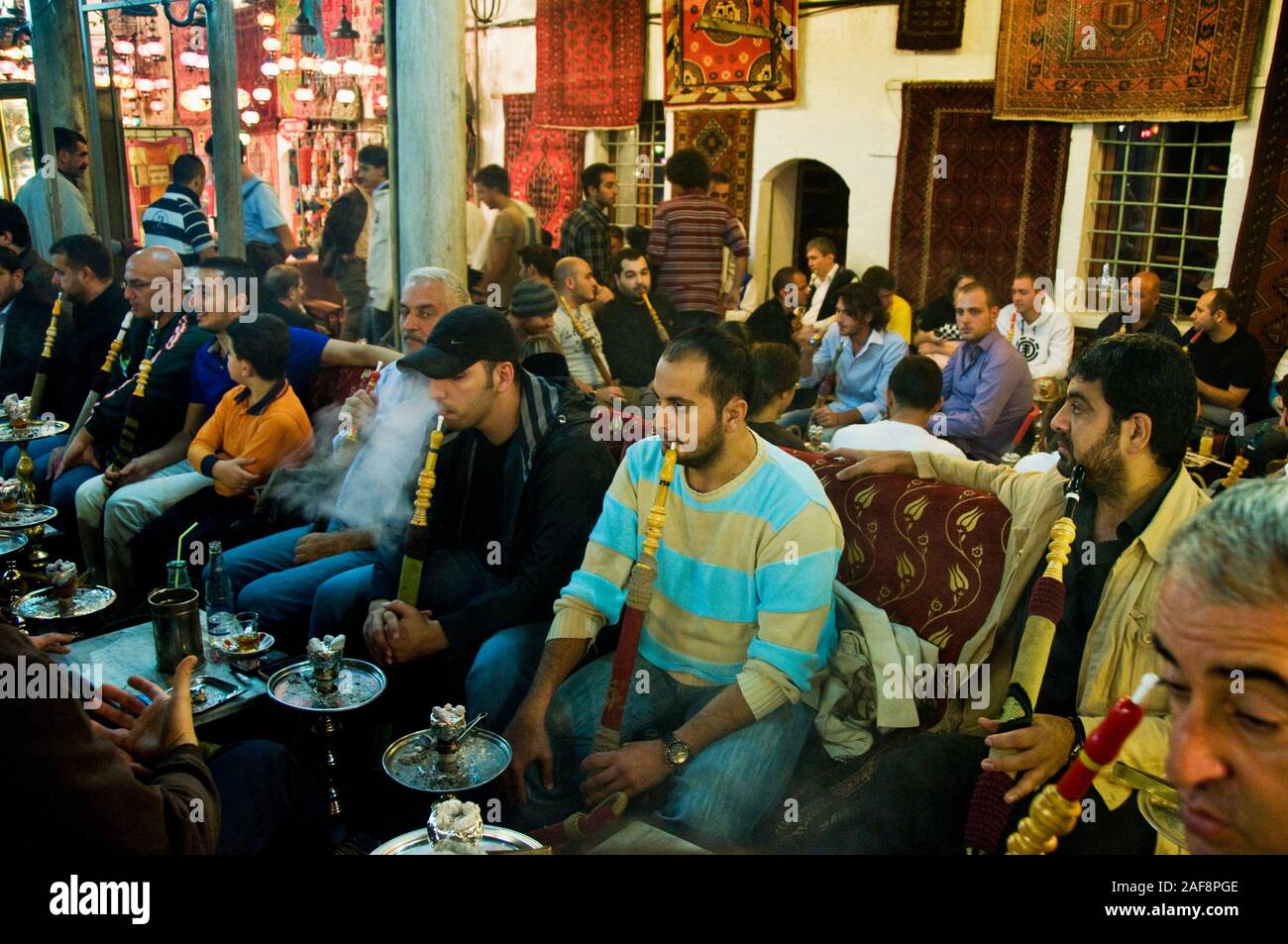 Men smoking nargileh and taking tea at Çorlulu Alipasa Medresesi ...