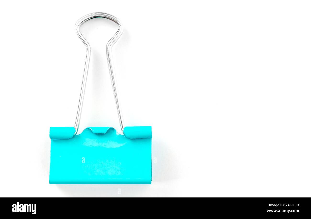 Single blue binder clip isolated on white background. Clerical clip for ...